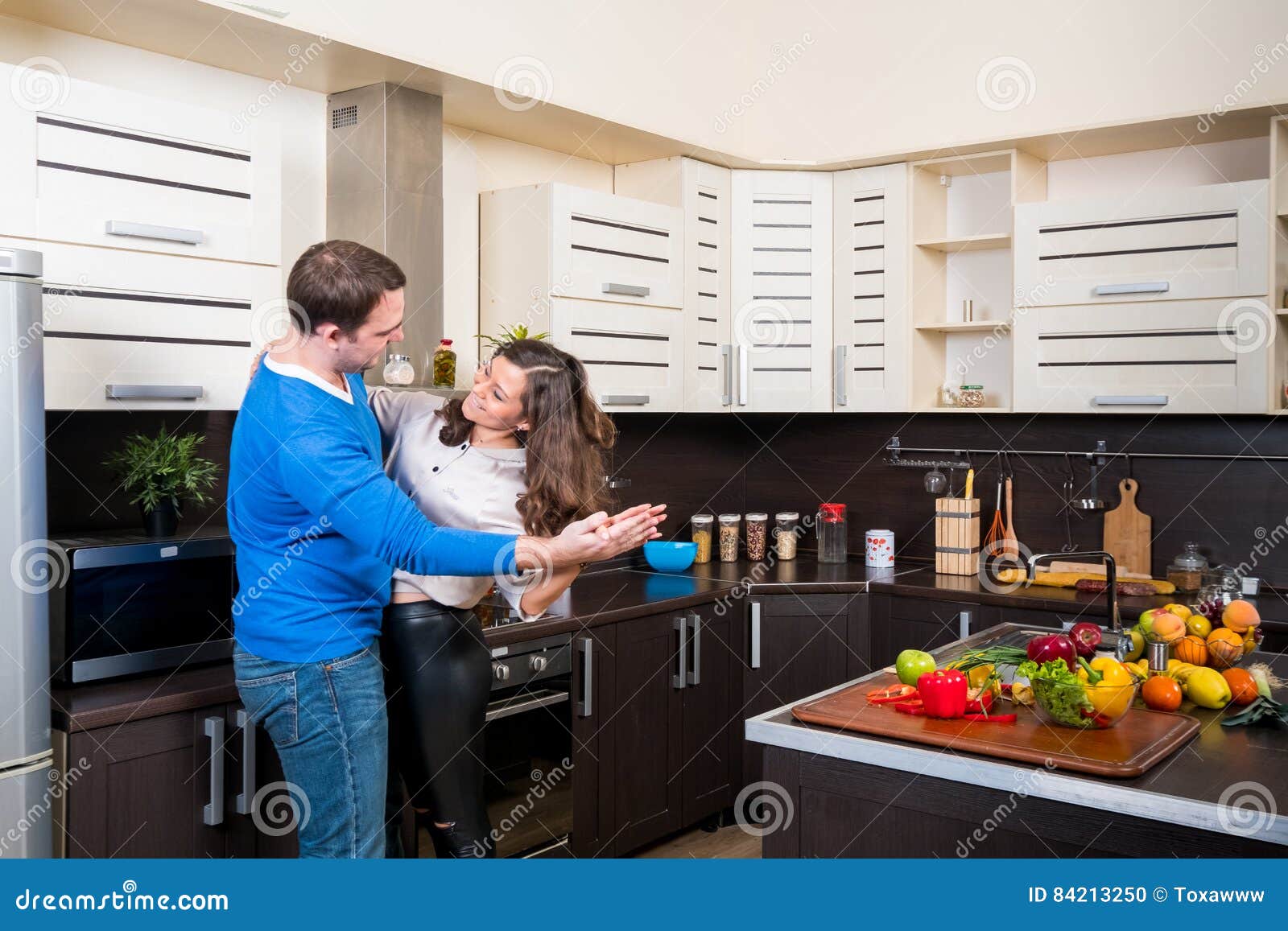 Young Couple Having Fun in the Kitchen Stock Photo - Image of male ...