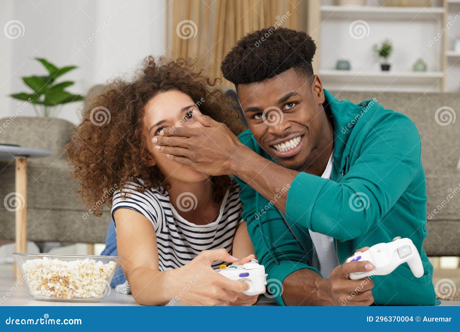 Young Couple Having Fun while Playing Video-games Stock Photo - Image ...
