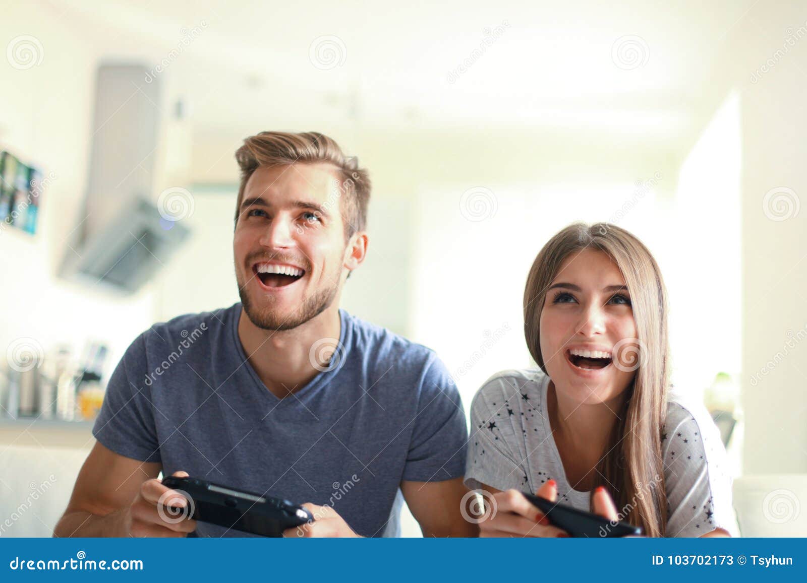 Young Couple Having Fun Playing Videogame at Home. Stock Image - Image ...