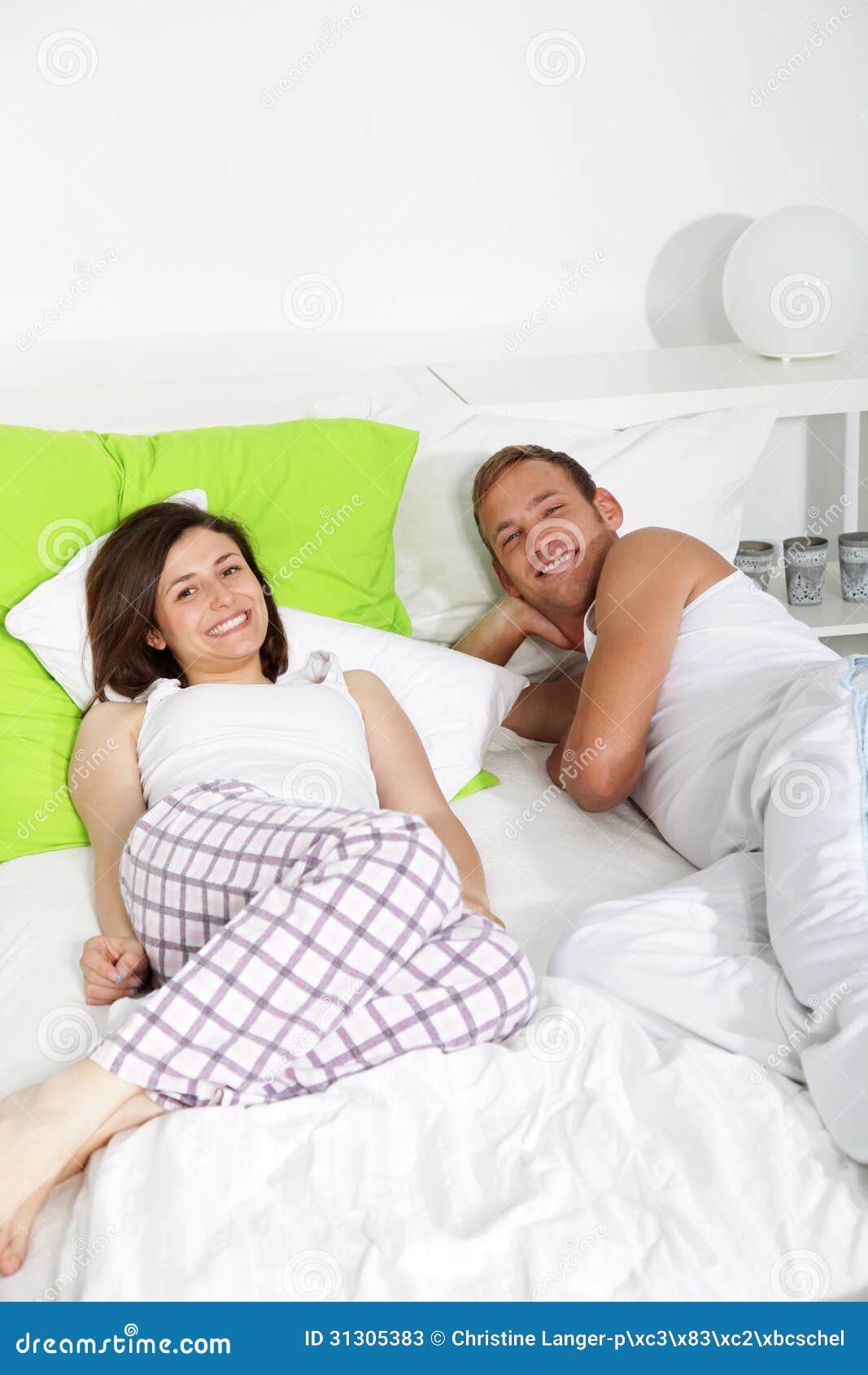 Young Couple Having a Lazy Day in Bed Stock Image - Image of relaxation ...