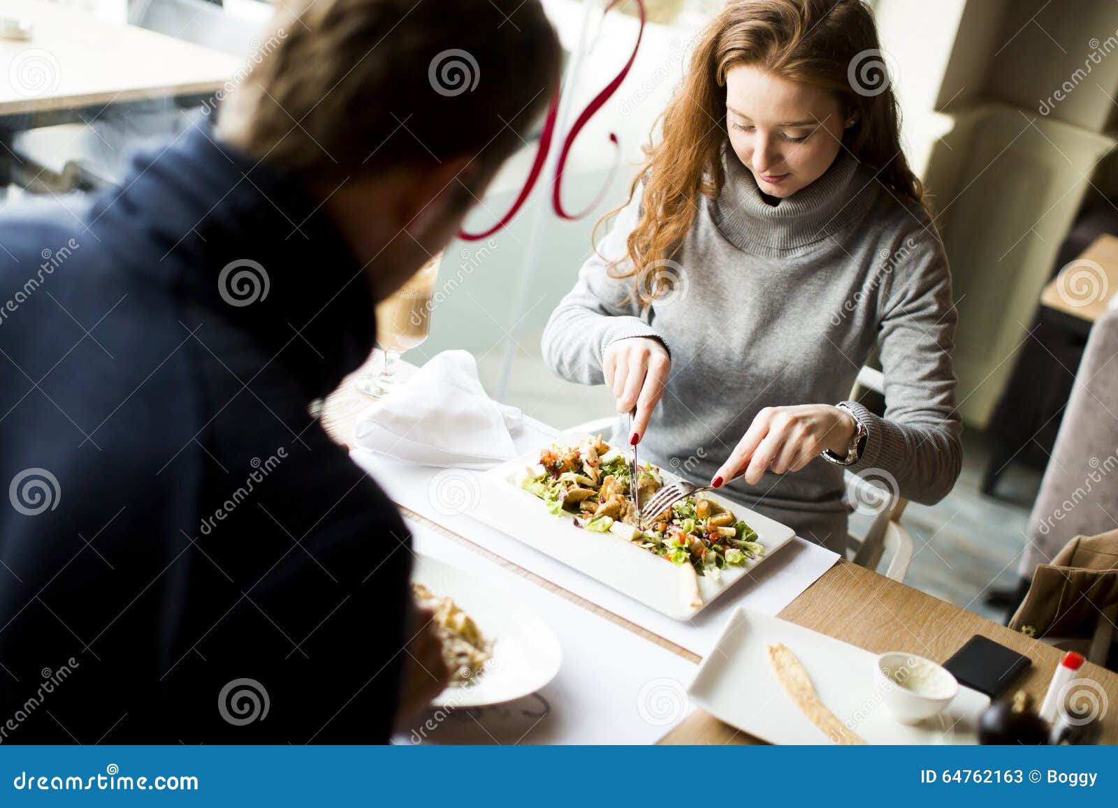 Young Couple Having Lunch in Restaurant Stock Image - Image of glass ...