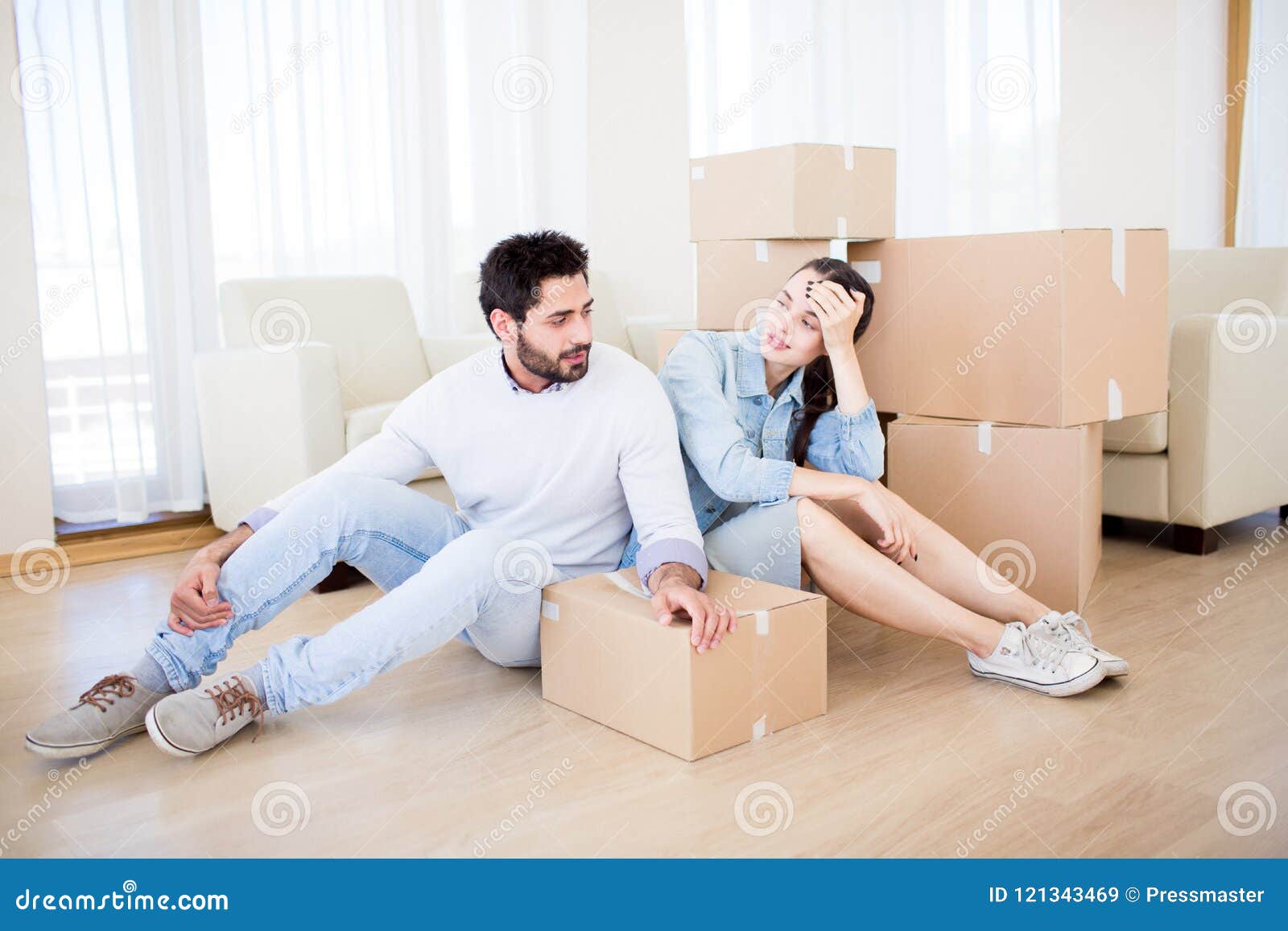 Deciding Where To Put Boxes Stock Image - Image of loan, husband: 121343469