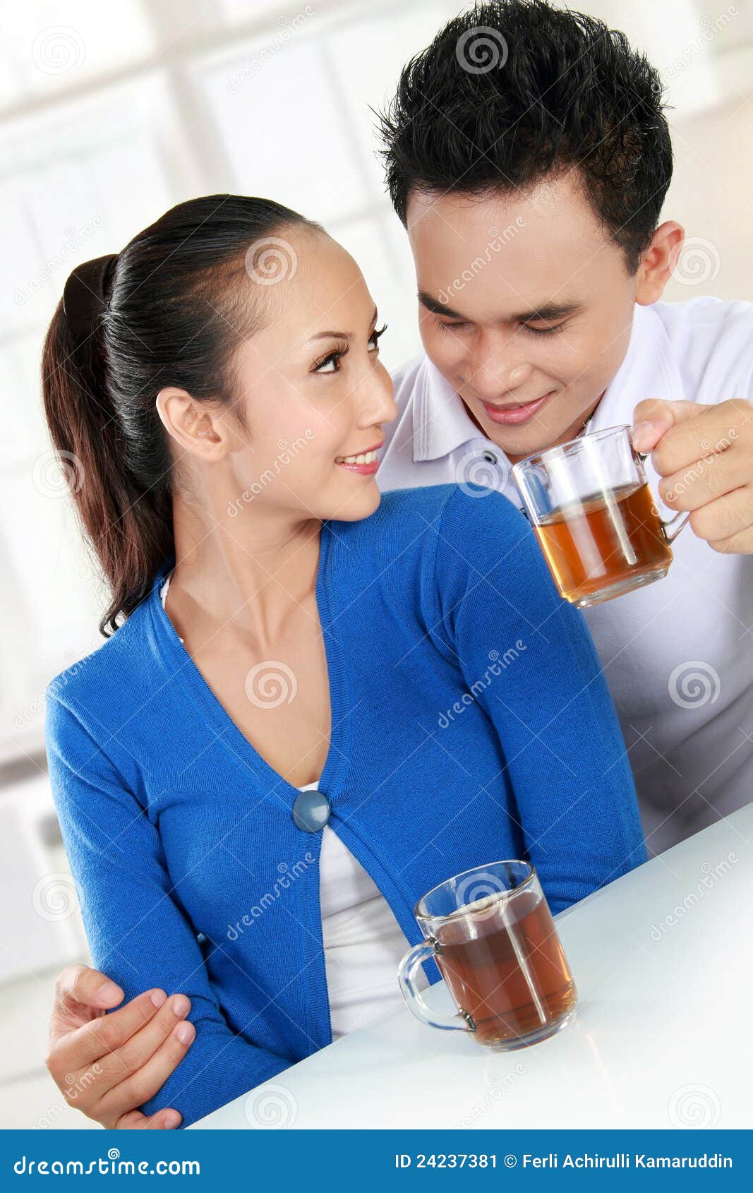 Young couple having a tea stock image. Image of love - 24237381