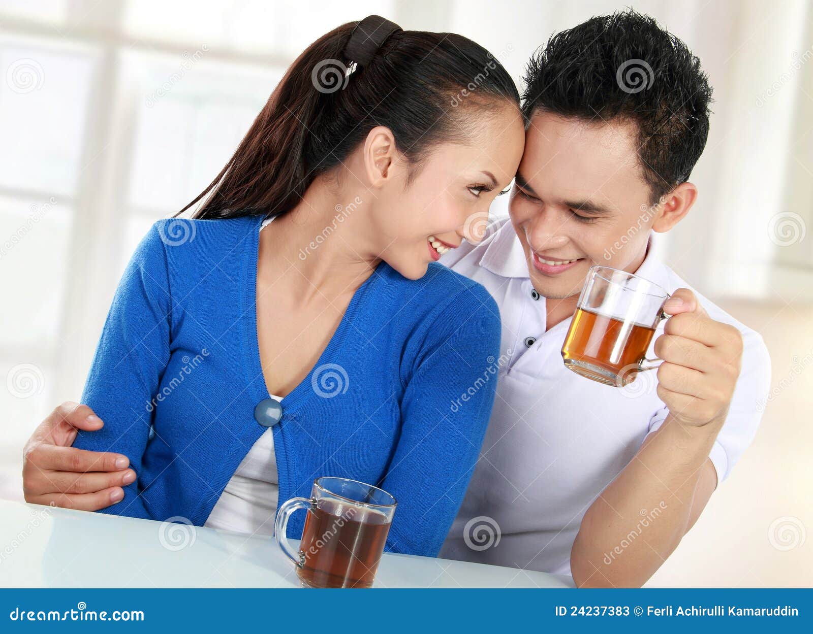 Young couple having a tea stock image. Image of breakfast - 24237383