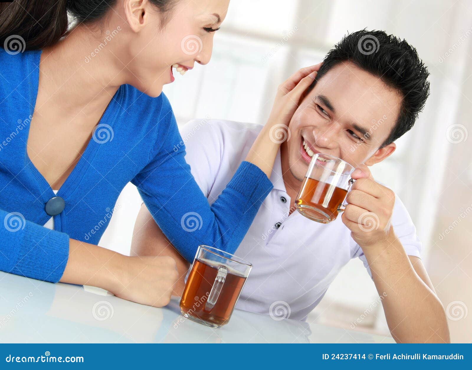 Young couple having a tea stock photo. Image of cheerful - 24237414