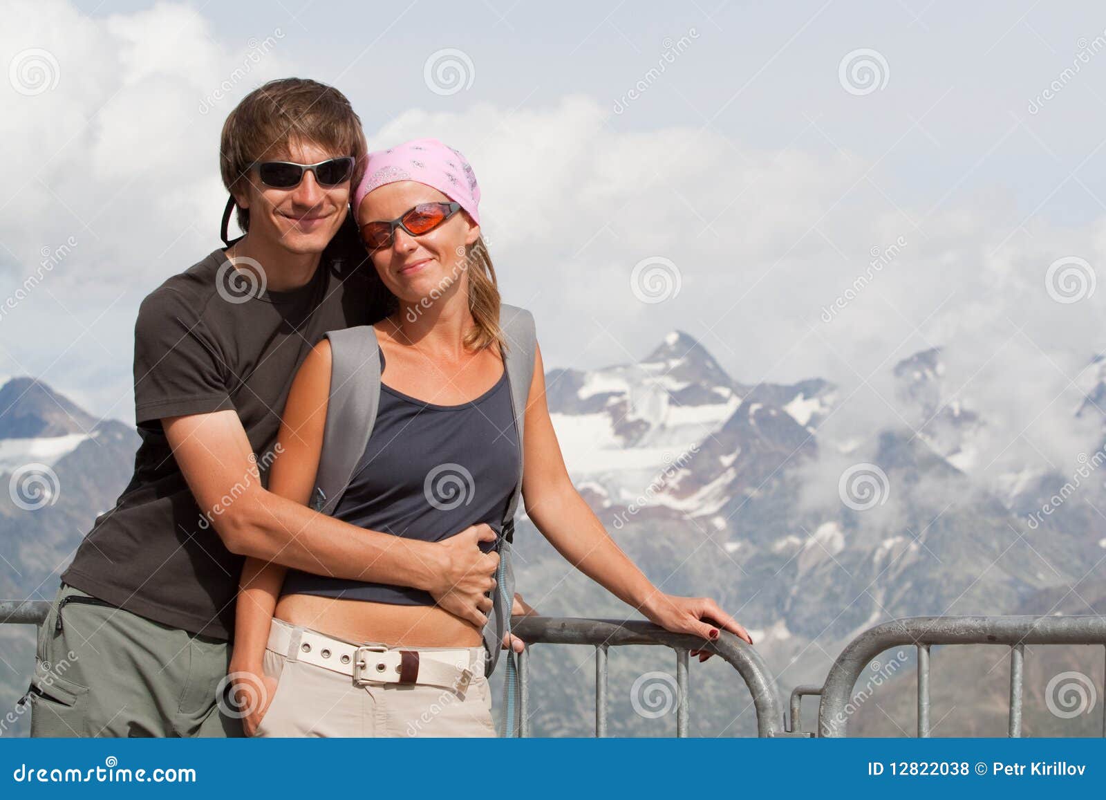 Young Couple High in the Mountains Stock Photo - Image of couple ...