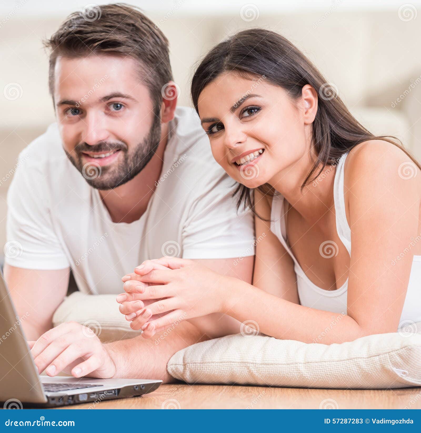 Young couple at home stock image. Image of happiness - 57287283