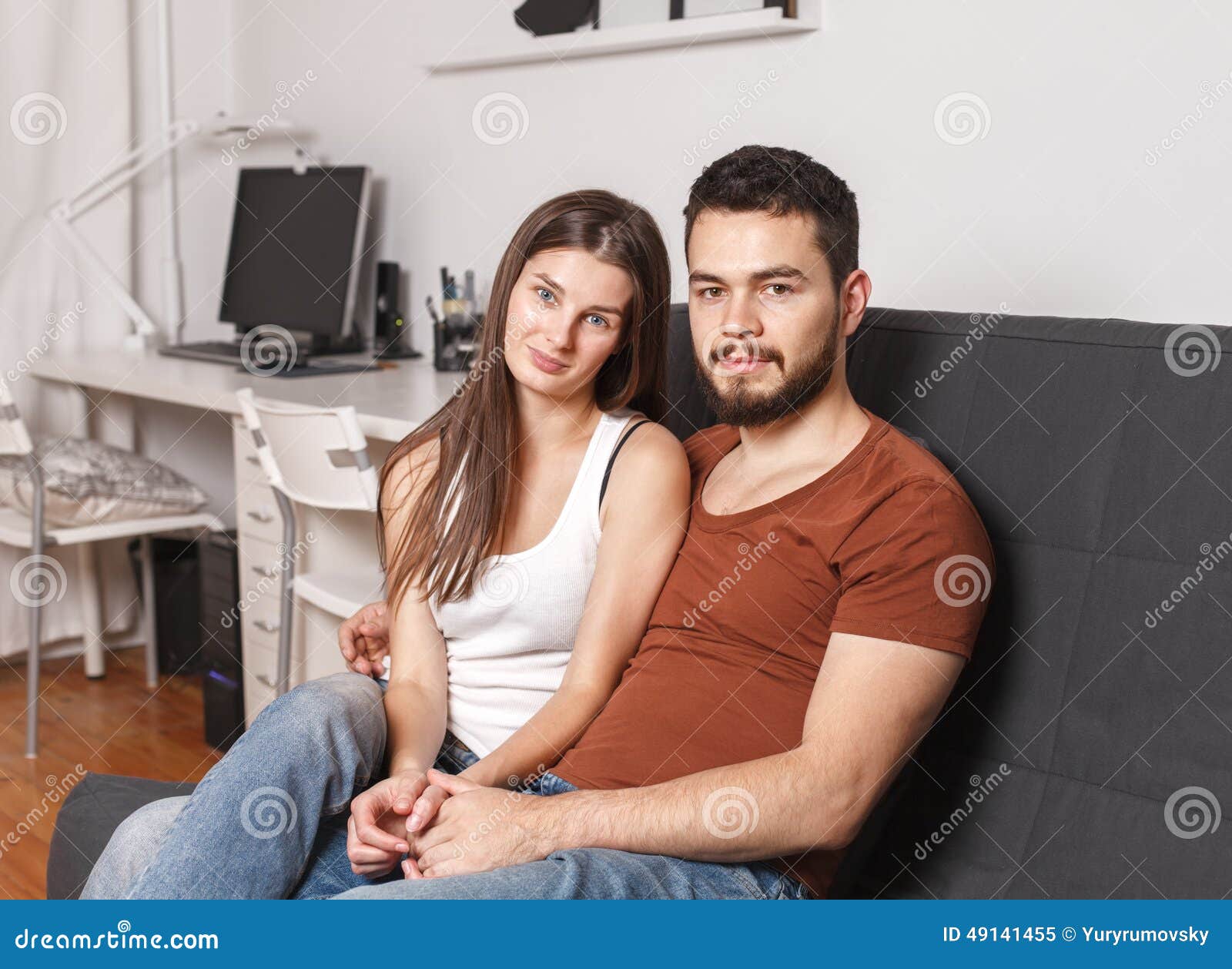 Young couple at home stock image. Image of brunet, love - 49141455