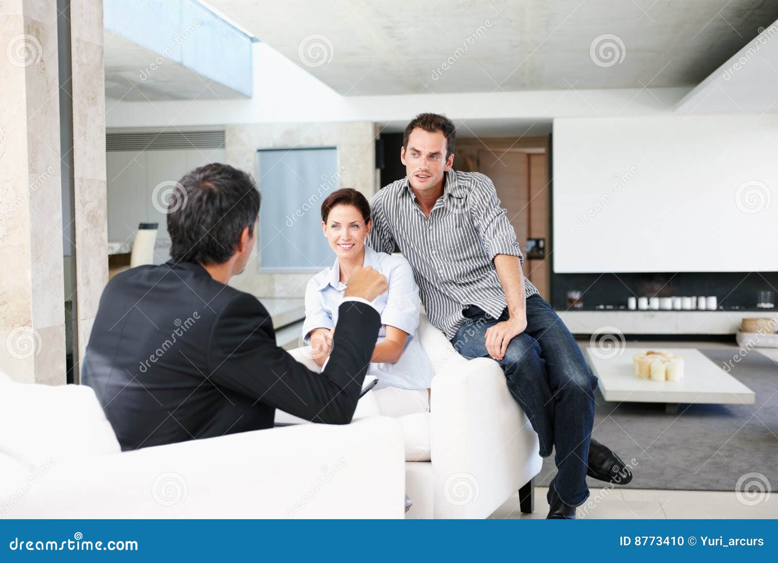 Young Couple at Home Discussion with a Agent Stock Photo - Image of ...