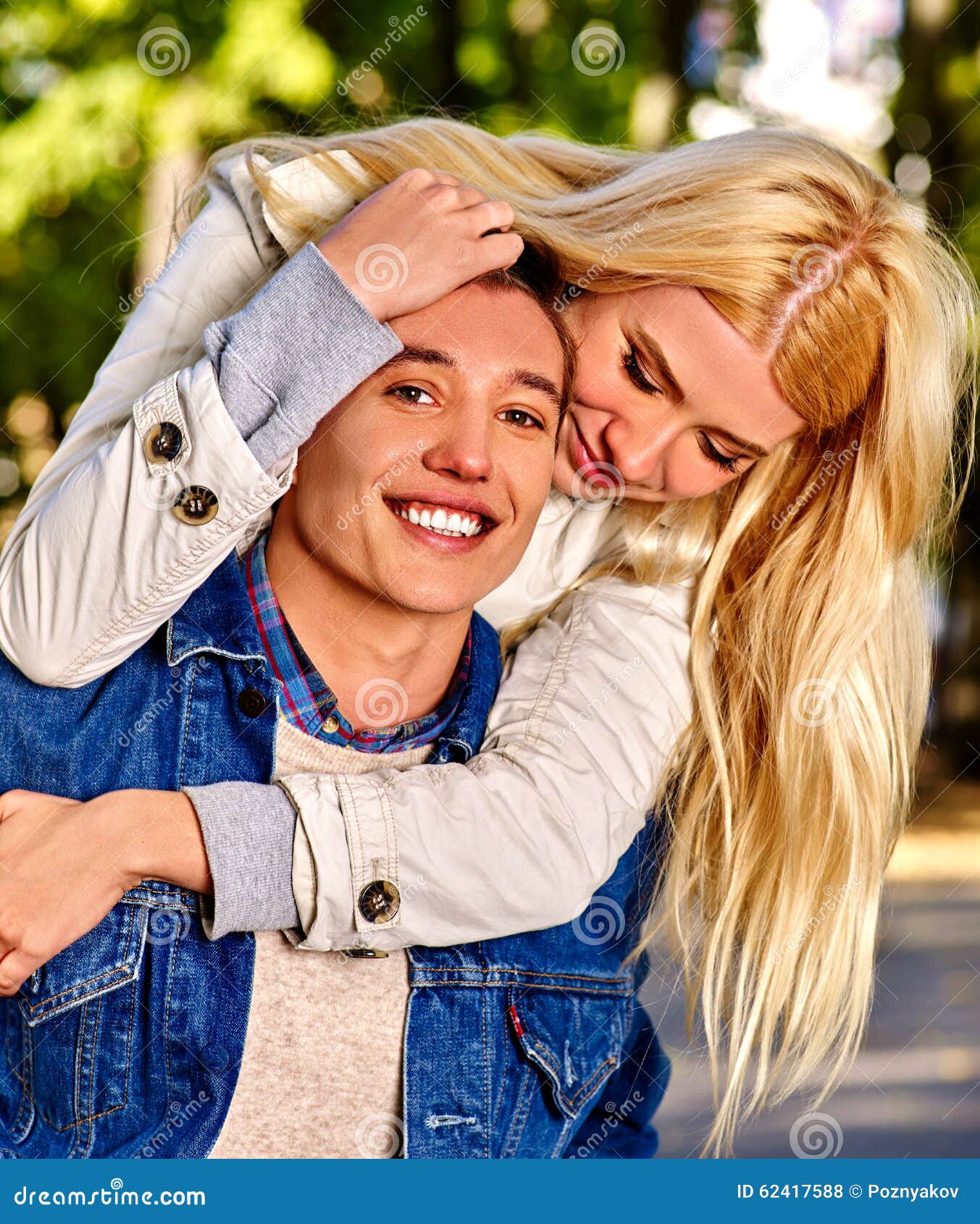 Young Couple Hugging and Flirting in Park Stock Photo - Image of casual ...