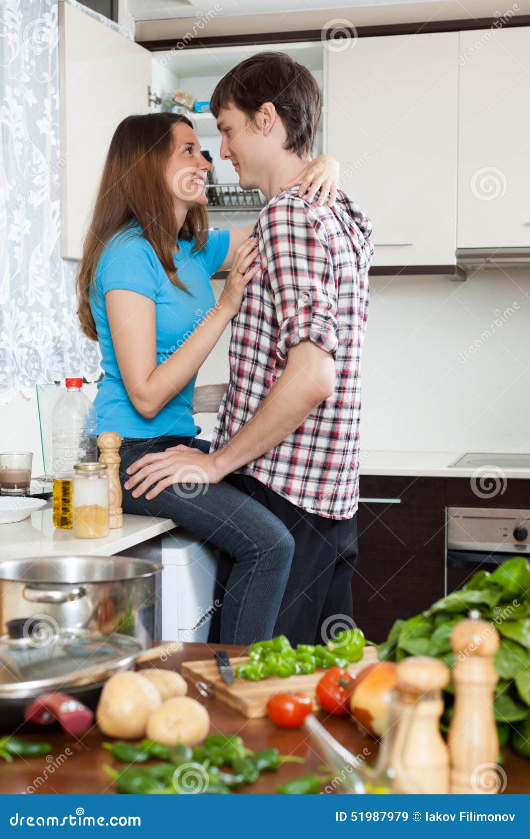 Young Couple Hugging in Kitchen Stock Image - Image of active, cooking ...