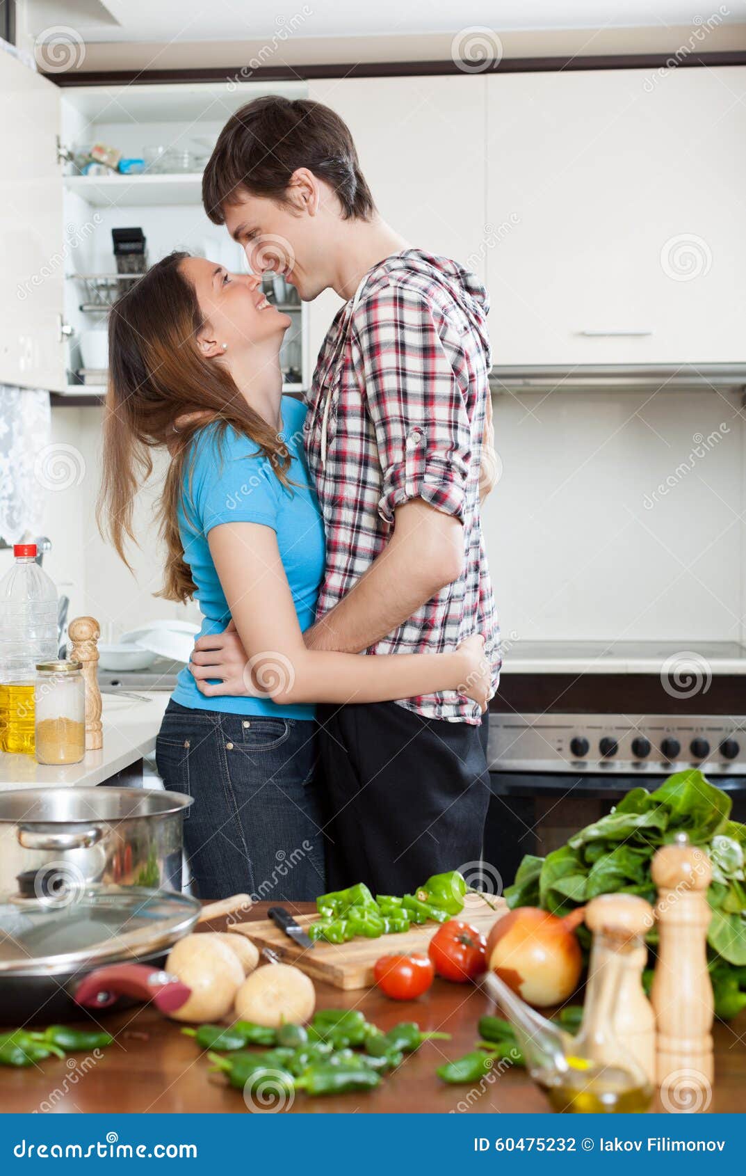 Young Couple Hugging in Kitchen Stock Photo - Image of kissing, flirt ...