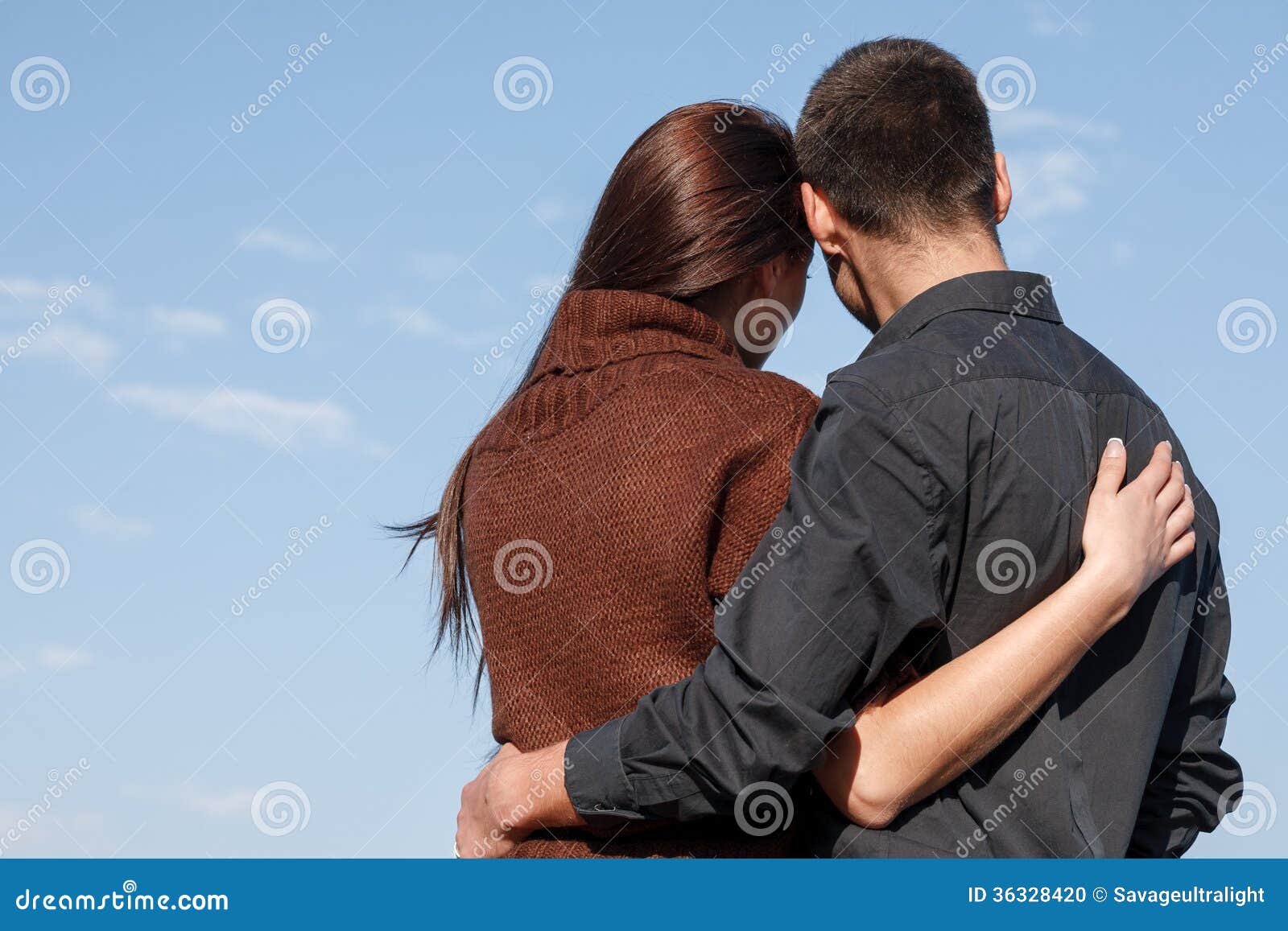 Young couple hugging stock photo. Image of clouds, lifestyle - 36328420
