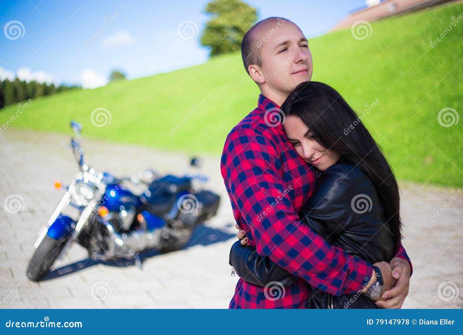Young Couple Hugging on Road with Retro Motorcycle Stock Photo - Image ...
