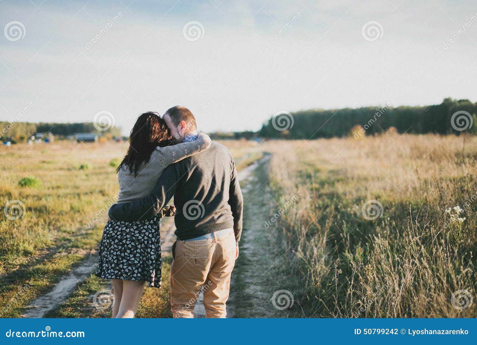 Young Couple Hugging at Sunset Stock Photo - Image of date, evening ...