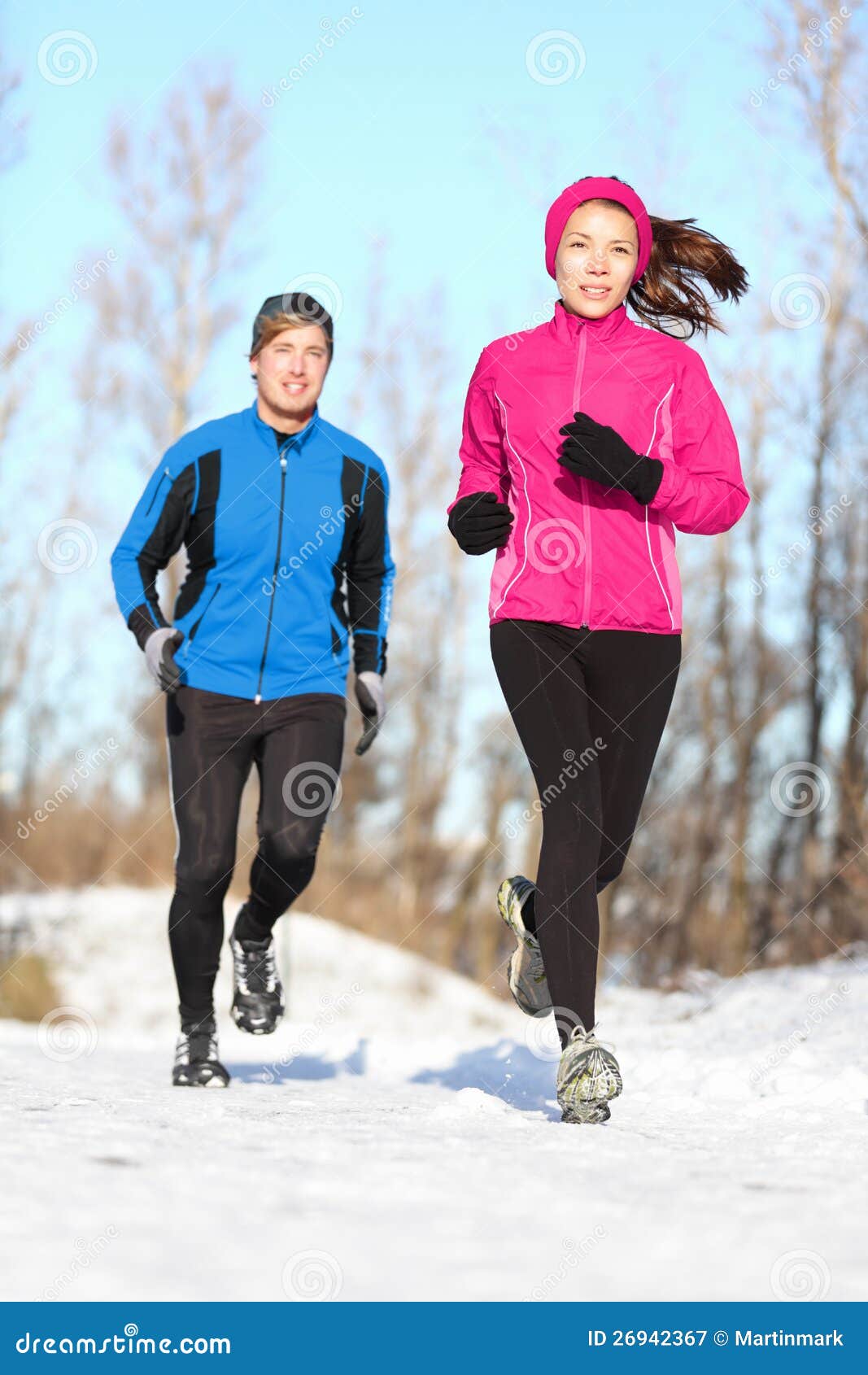 Young Couple Jogging in Winter Snow Stock Image - Image of female ...