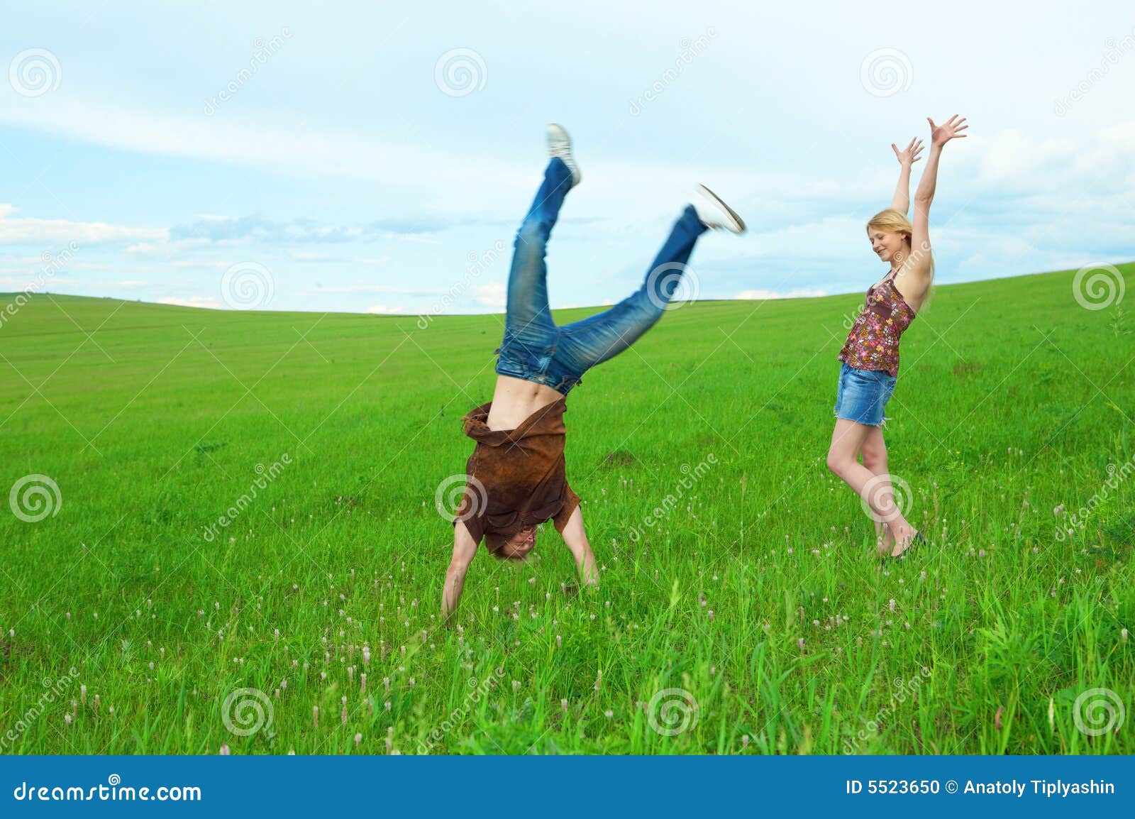 Young Couple Jump Around in the Nature Stock Photo - Image of happiness ...