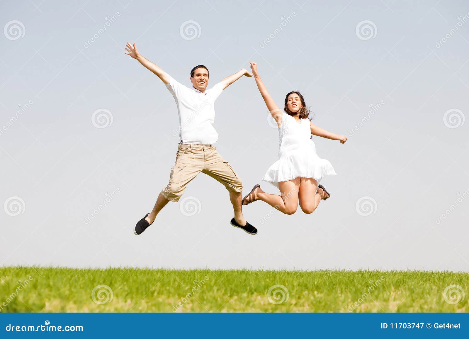 Young Couple Jumping stock image. Image of copy, couple - 11703747