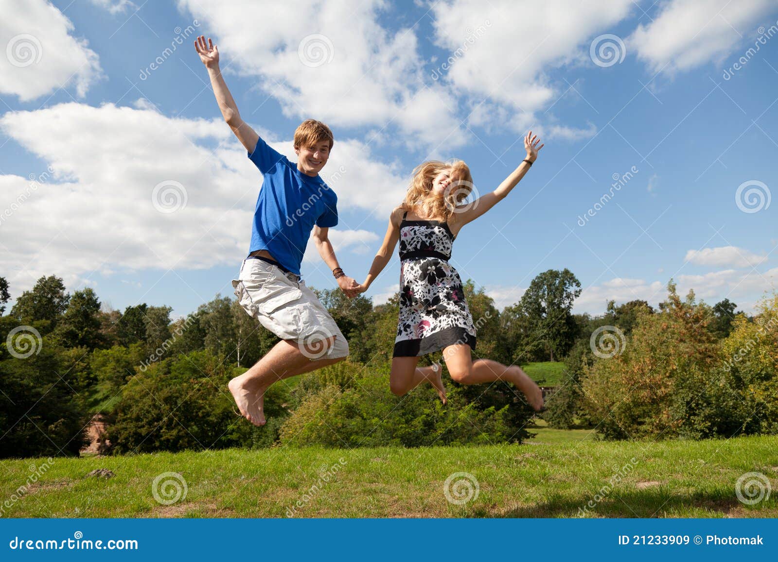Young couple jumping stock image. Image of front, jump - 21233909