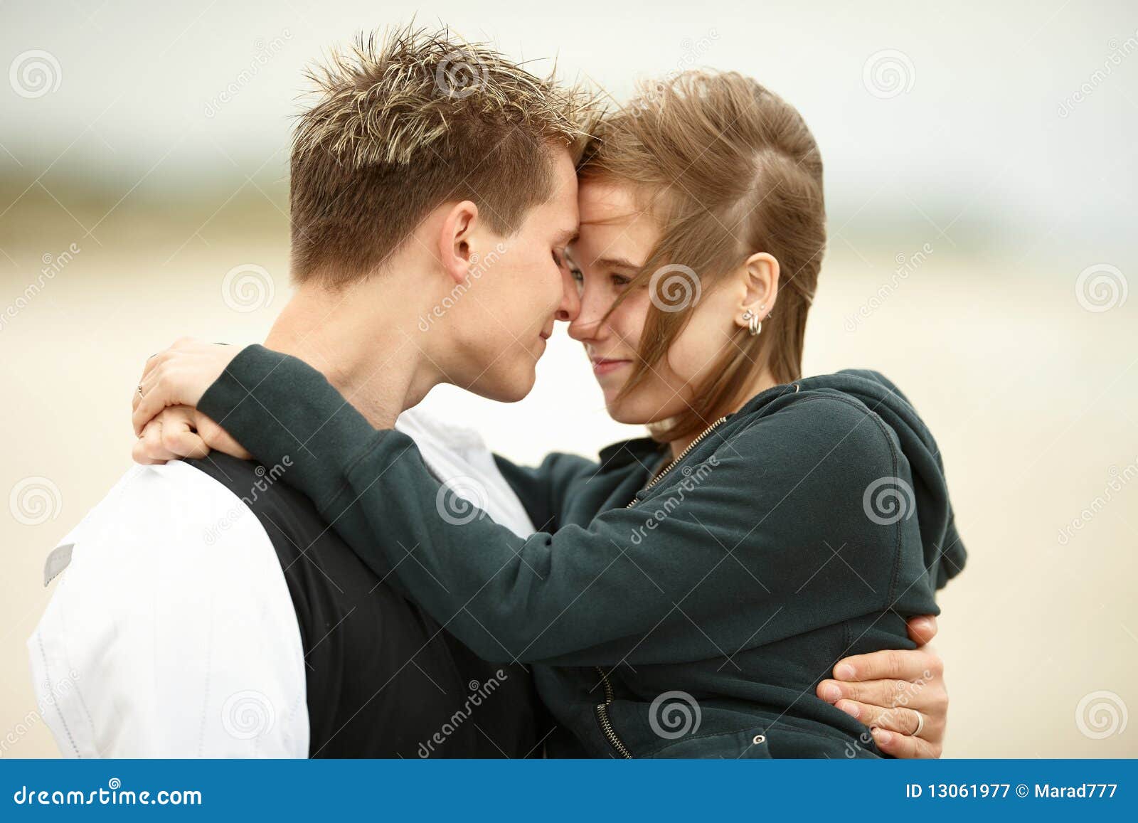 Young Couple Kissing on Beach Stock Image - Image of details, caucasian ...