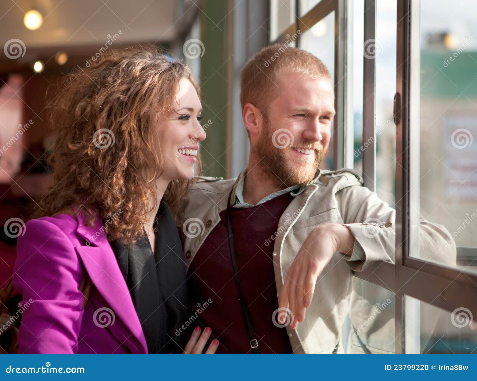Young Couple Kisssing Near the Window Inside. Stock Photo - Image of ...