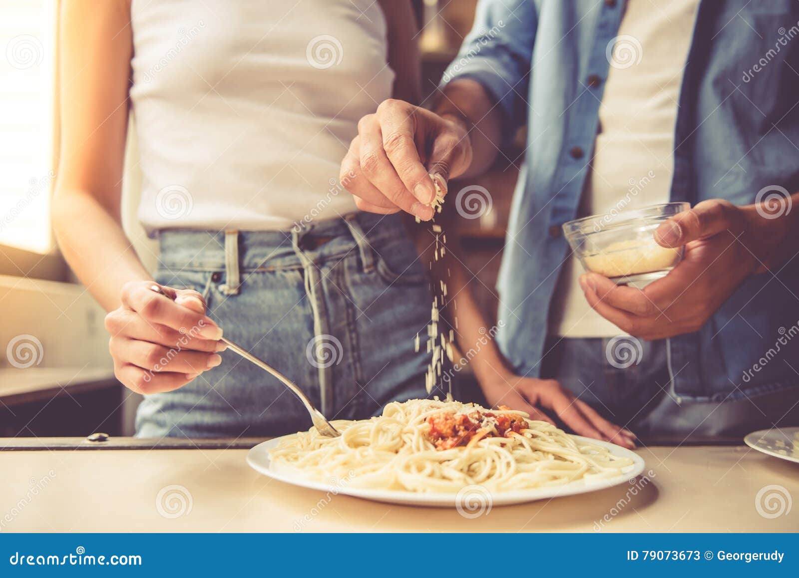 Young couple in kitchen stock image. Image of marriage - 79073673