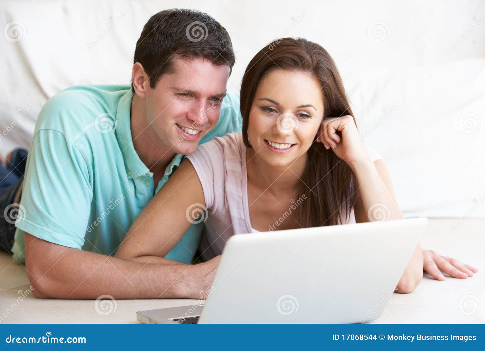 Young Couple on Laptop Computer Stock Photo - Image of indoors ...