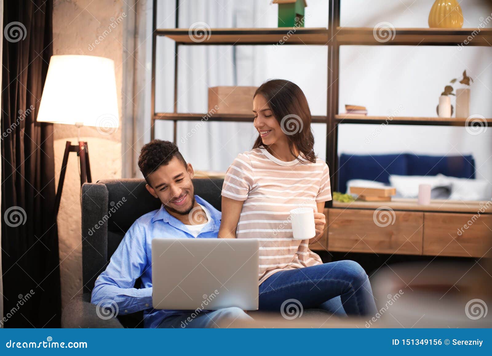 Young Couple with Laptop Resting at Home Stock Photo - Image of couple ...