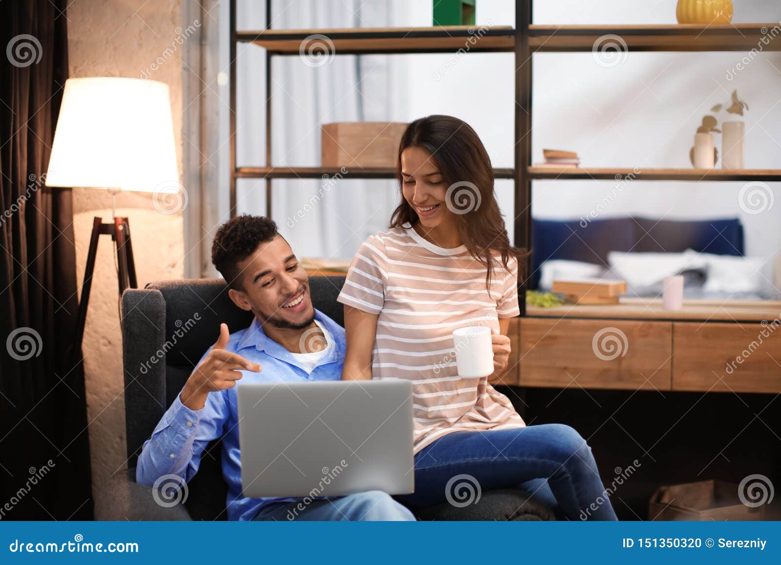 Young Couple with Laptop Resting at Home Stock Photo - Image of laptop ...