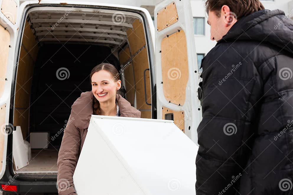Young Couple Loading a Moving Truck Stock Photo - Image of freight ...