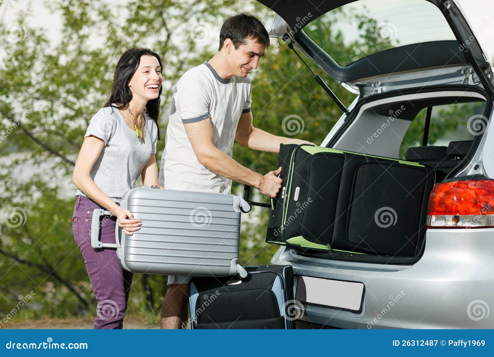 Young Couple Loading Suitcases in the Car Boot Stock Image - Image of ...