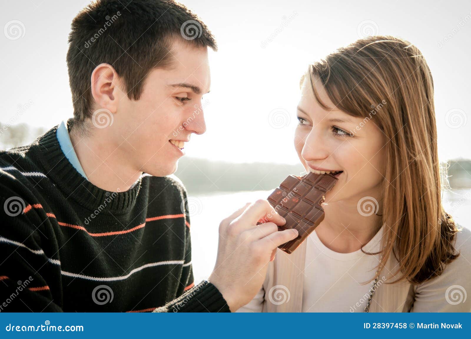 Young Couple in Locve Eating Chocolate Stock Photo - Image of happiness ...
