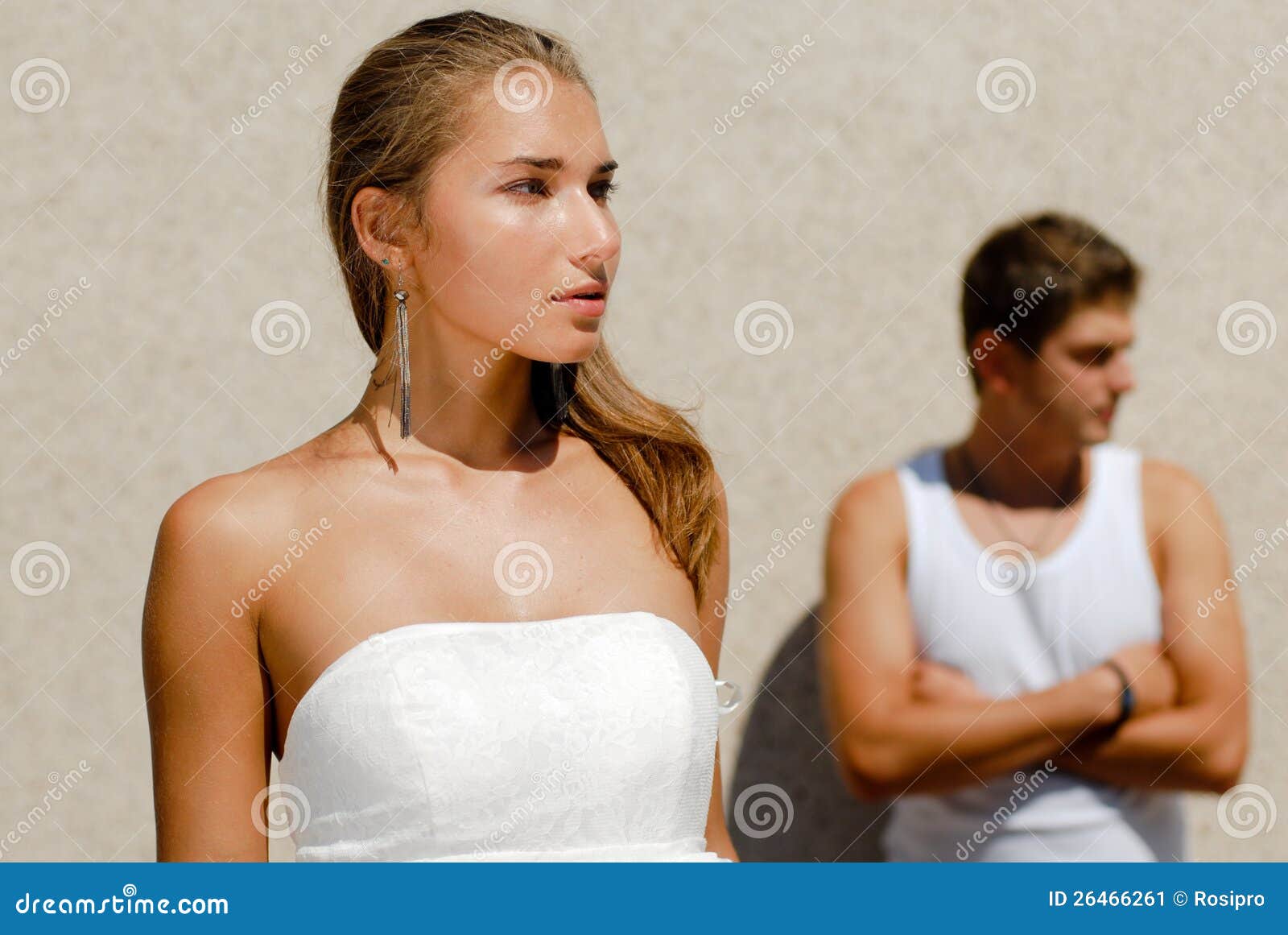 Young Couple Looking in Opposite Directions Stock Image - Image of ...