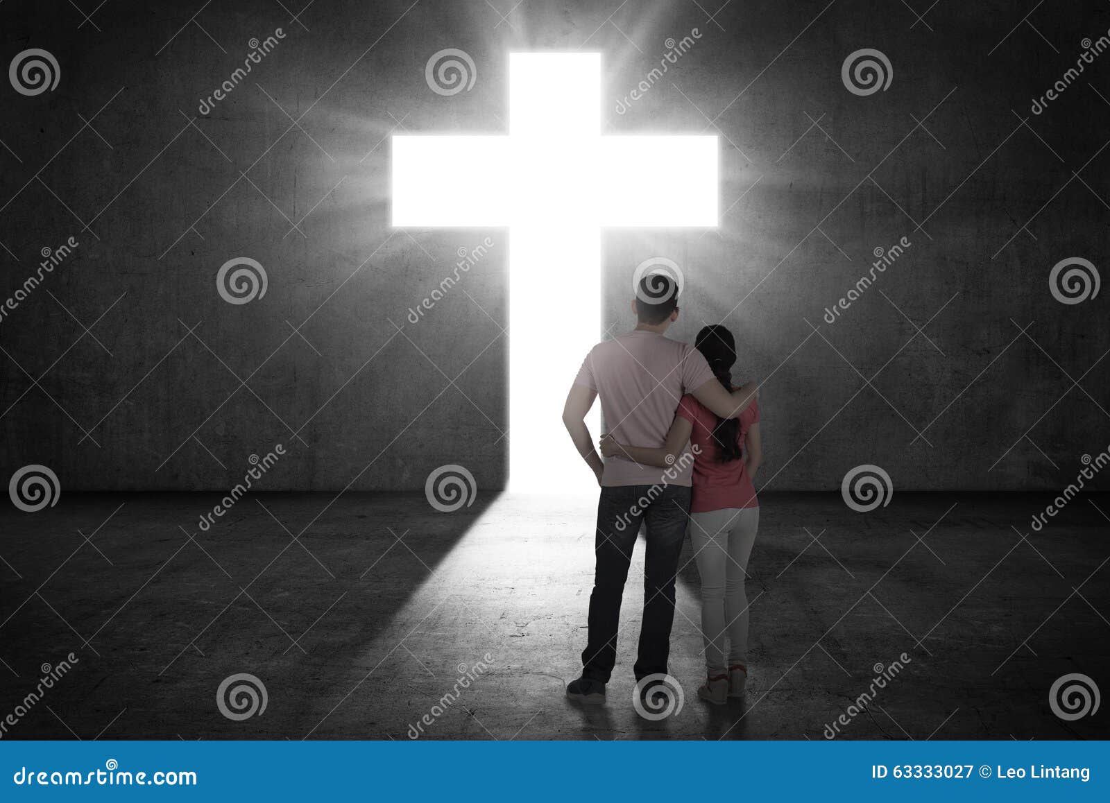 Young Couple Looking the Shining Cross on the Wall Stock Image - Image ...