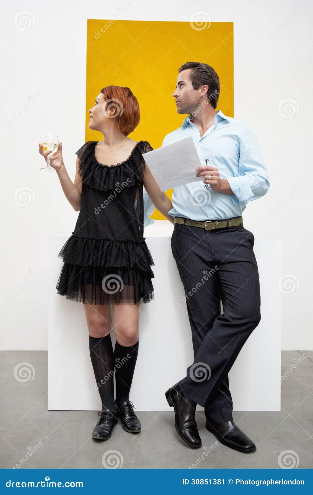 Young Couple Looking at Something Interesting with Curiosity Stock ...