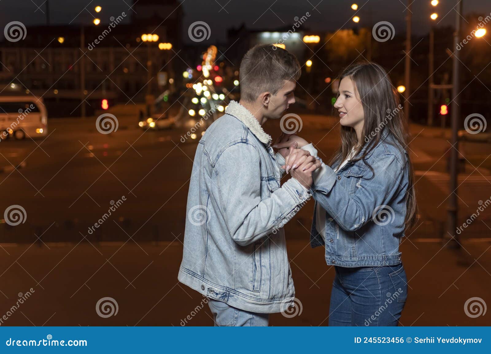 Young Couple in Love Dancing on Evening City Background Stock Photo ...