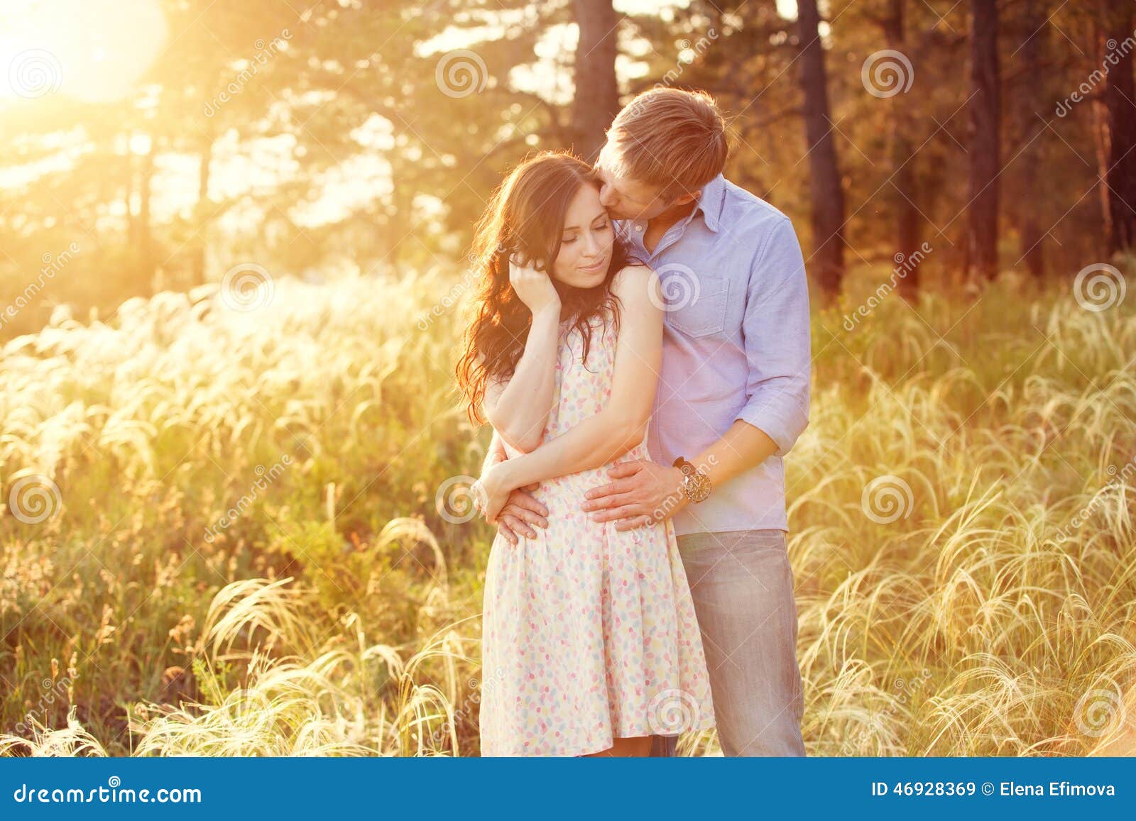 Young Couple in Love at Sunset at the Field Stock Image - Image of ...