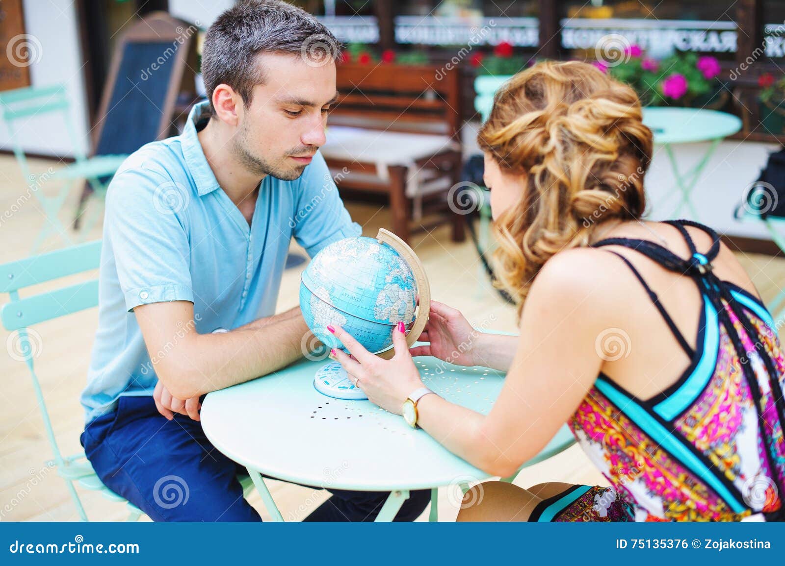 Young Couple Making Plans for Their Next Travel Destination Stock Photo ...