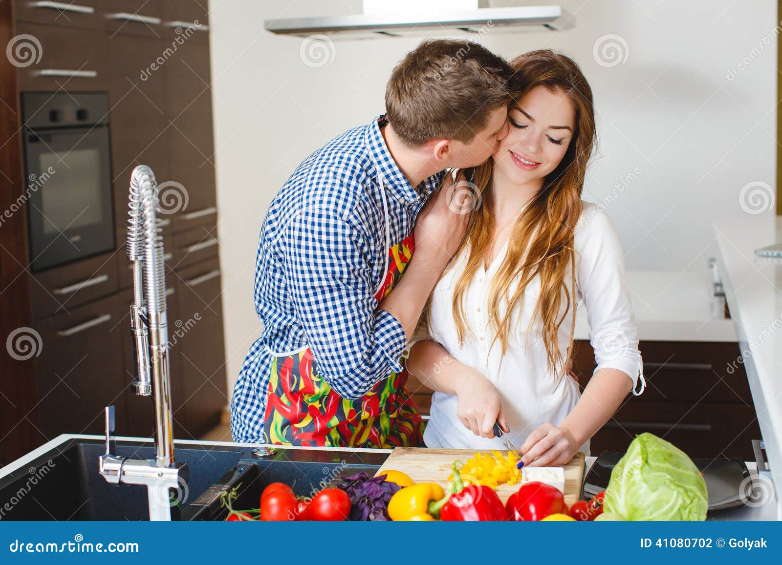 Young Couple Making a Salad Together in the Kitchen Stock Photo - Image ...