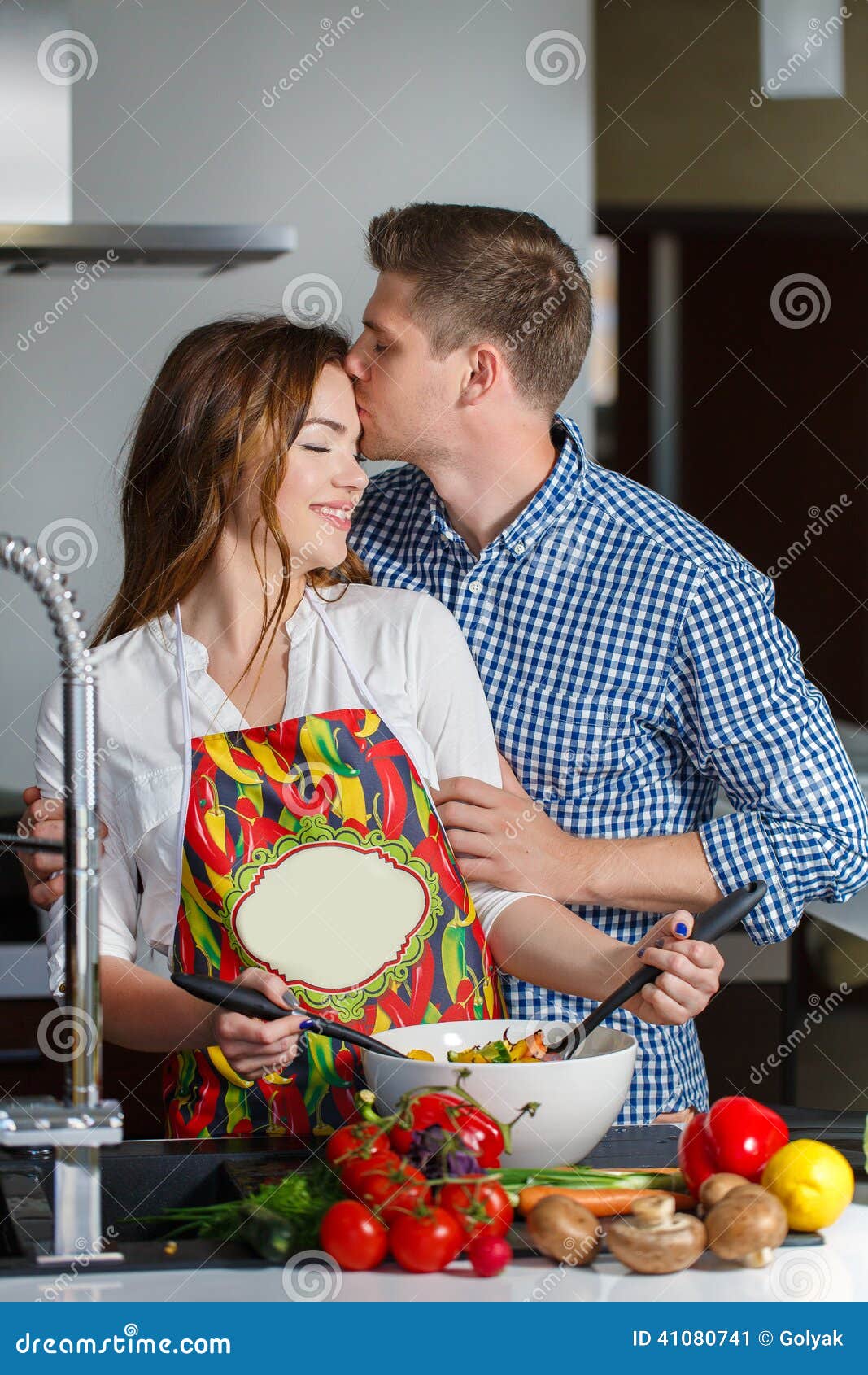 Young Couple Making a Salad Together in the Kitchen Stock Image - Image ...
