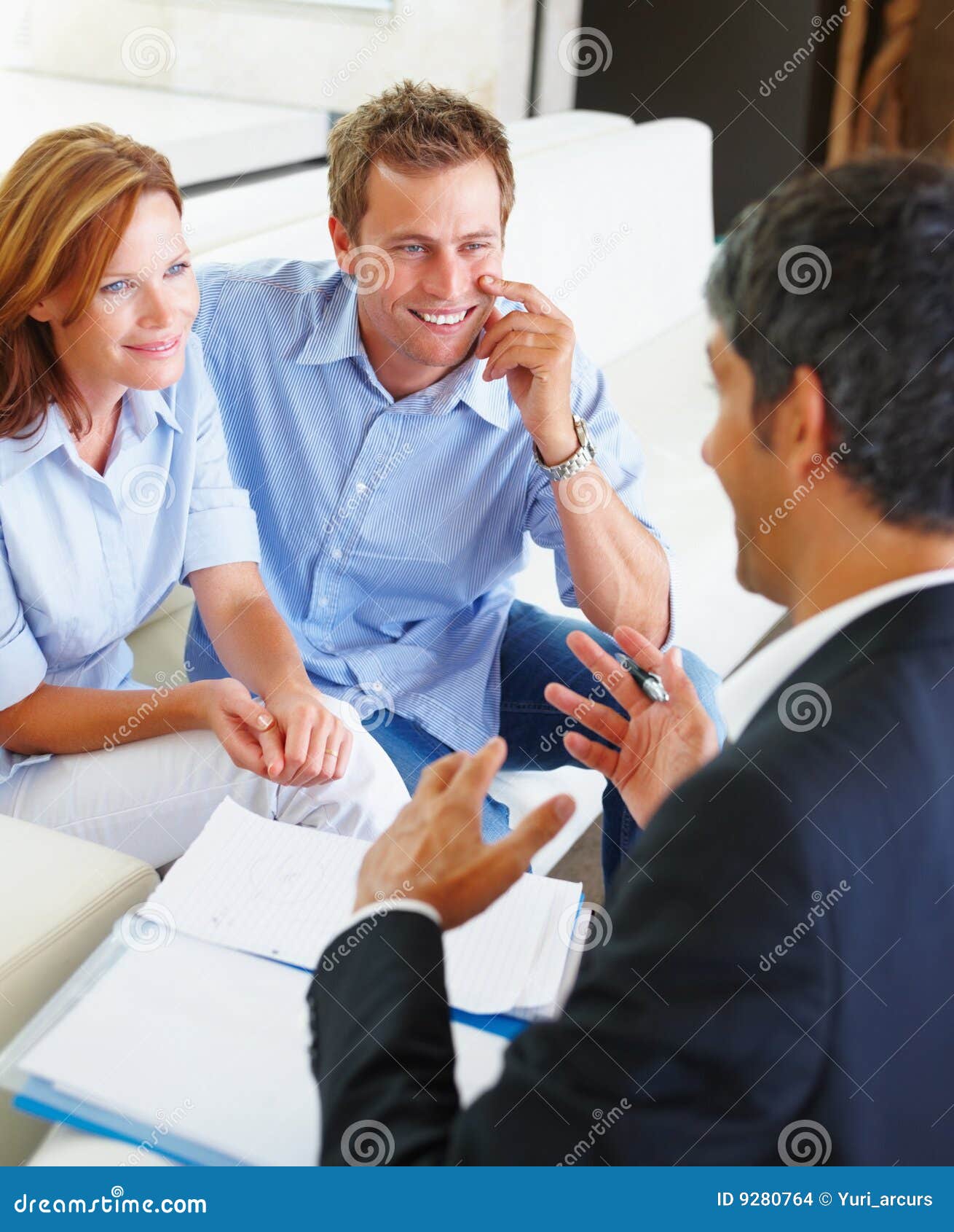 Young Couple at Meeting with a Financial Planner Stock Photo - Image of ...