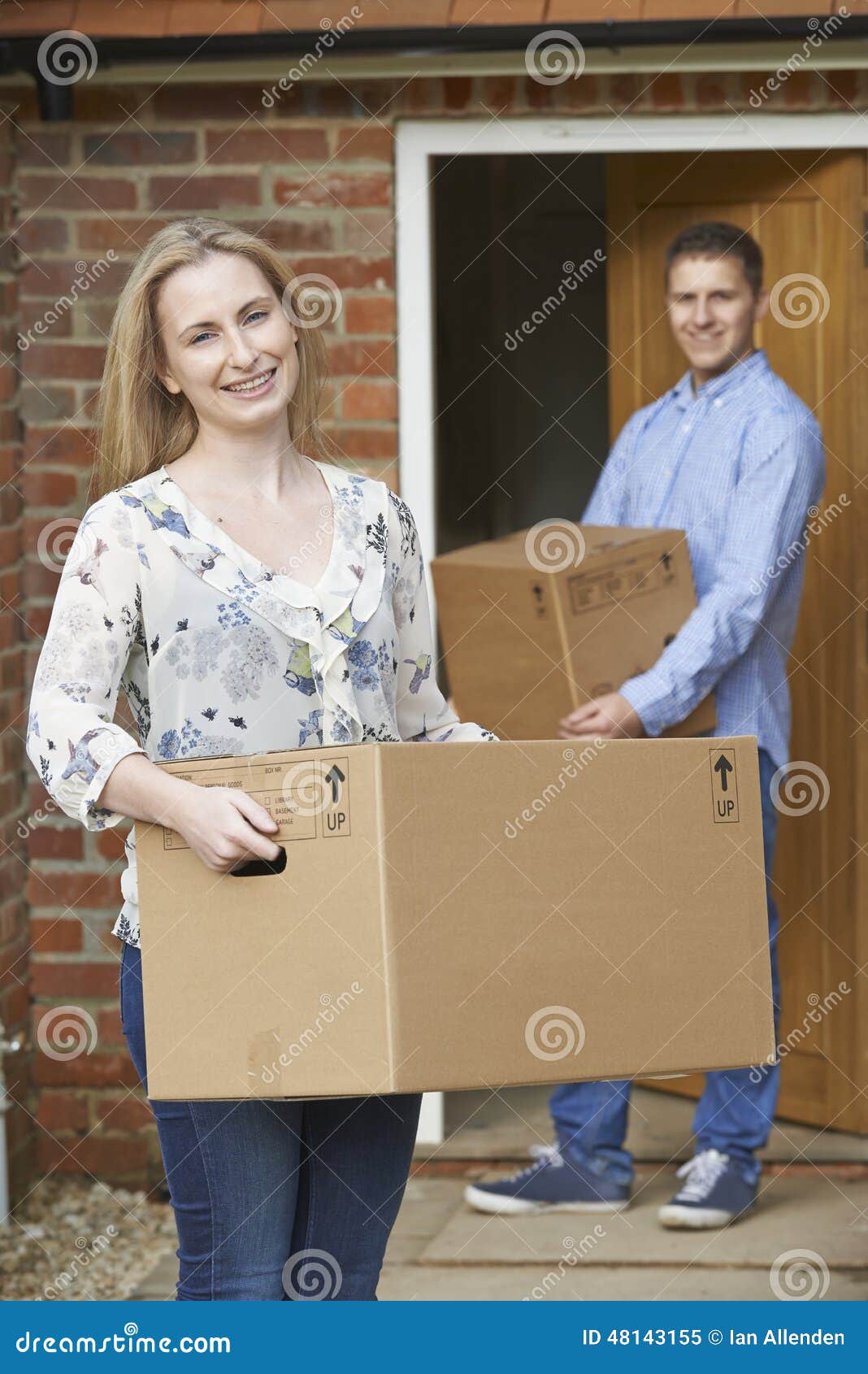 Young Couple Moving into New Home Together Stock Image - Image of ...