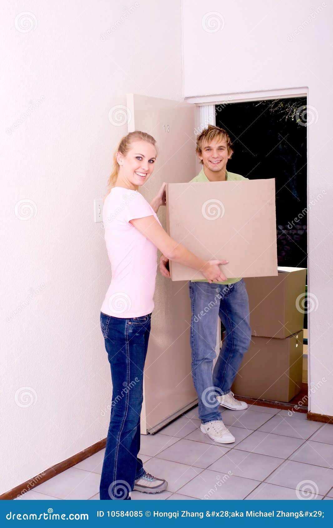 Young couple moving out stock image. Image of female - 10584085