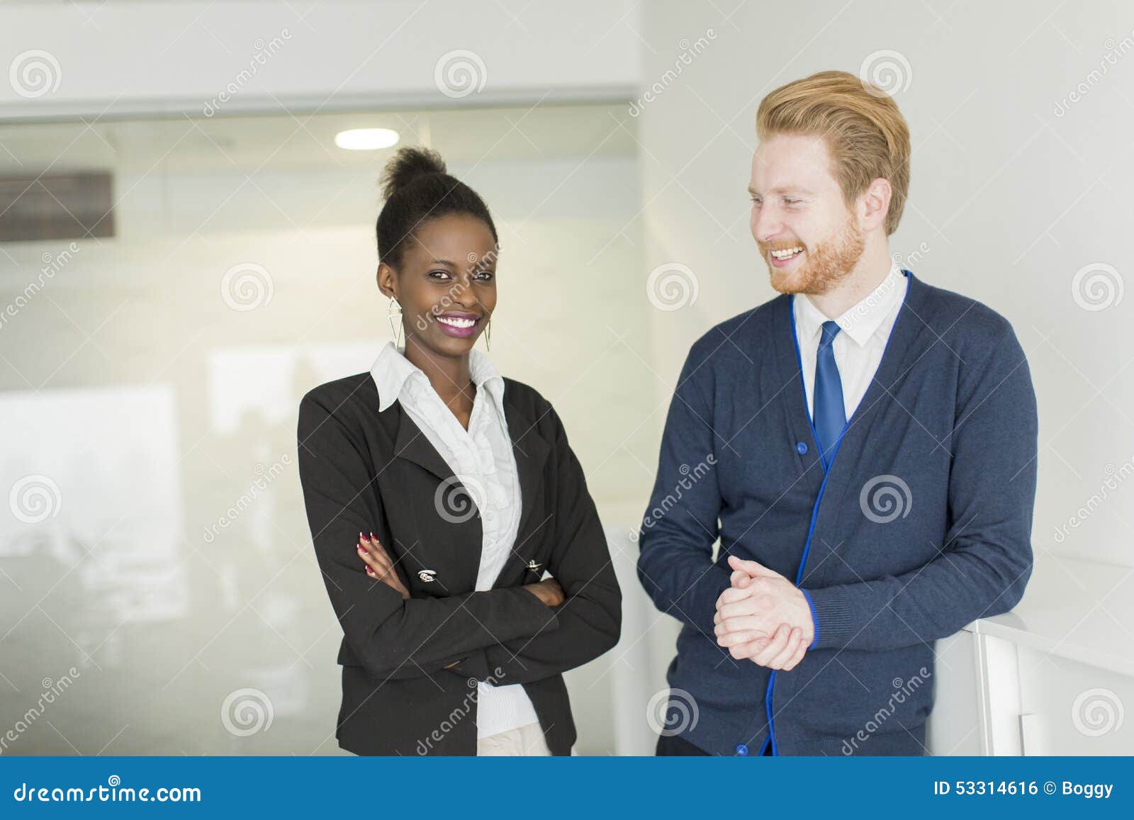 Young couple in the office stock photo. Image of coiple - 53314616