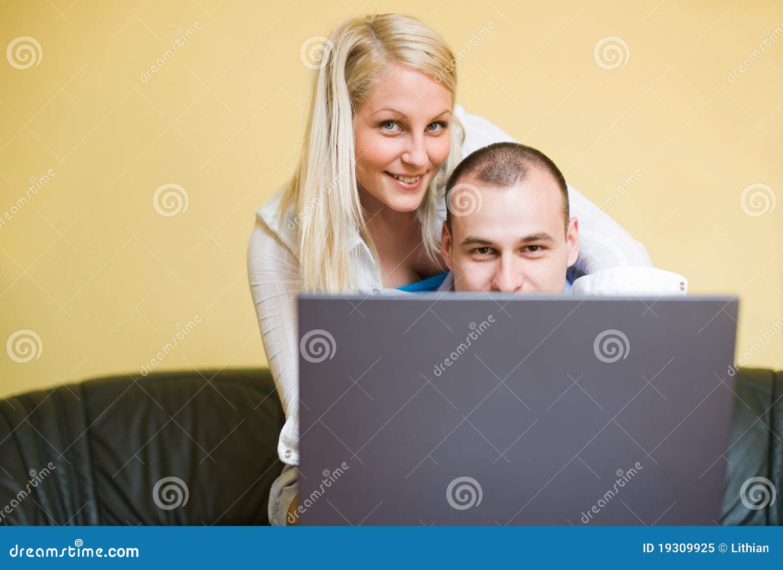 Young Couple Peeking Over Laptop Screen Stock Image - Image of gorgeous ...