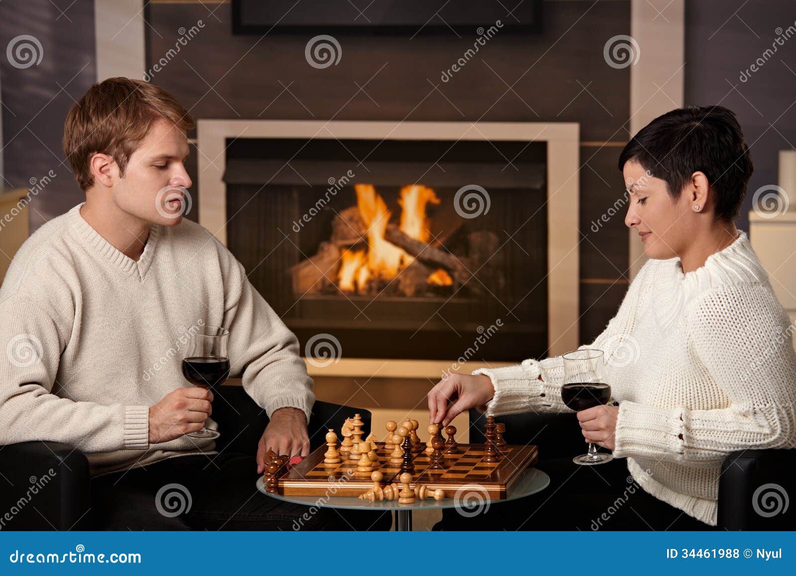 Young couple playing chess stock photo. Image of 2530 - 34461988