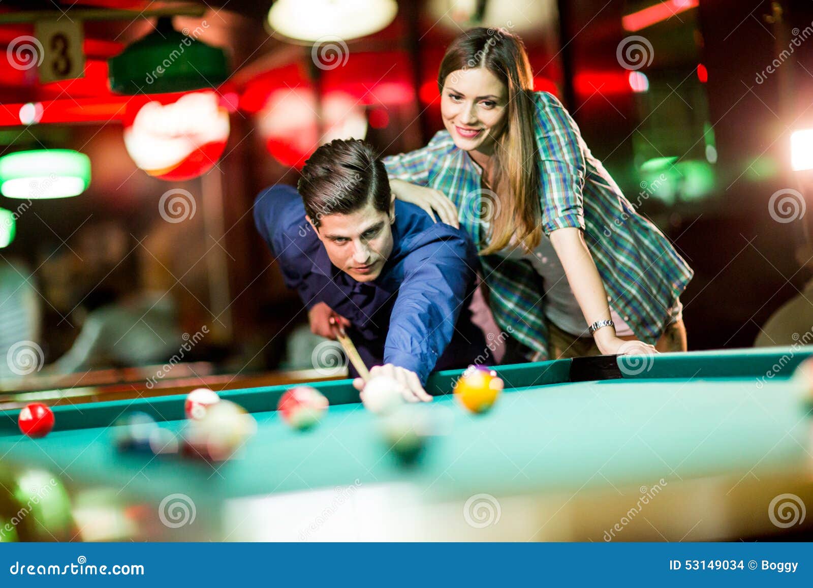 Young couple playing pool stock photo. Image of adults - 53149034