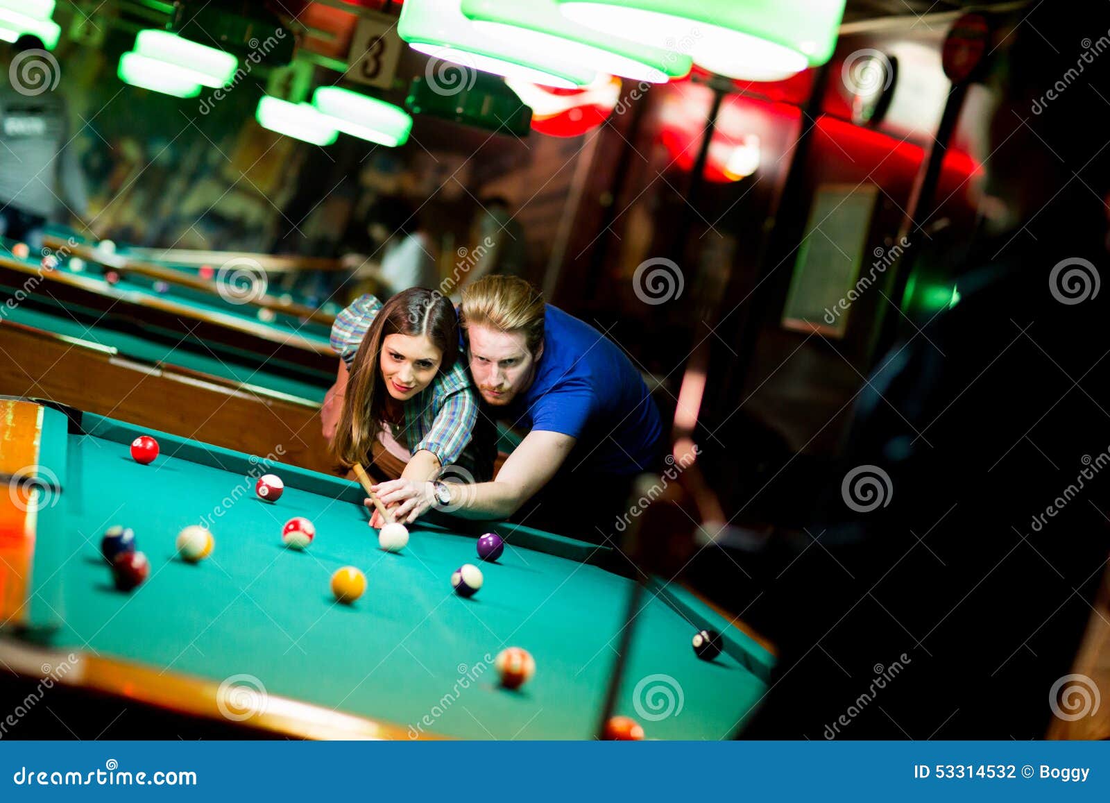 Young couple playing pool stock photo. Image of relaxation - 53314532