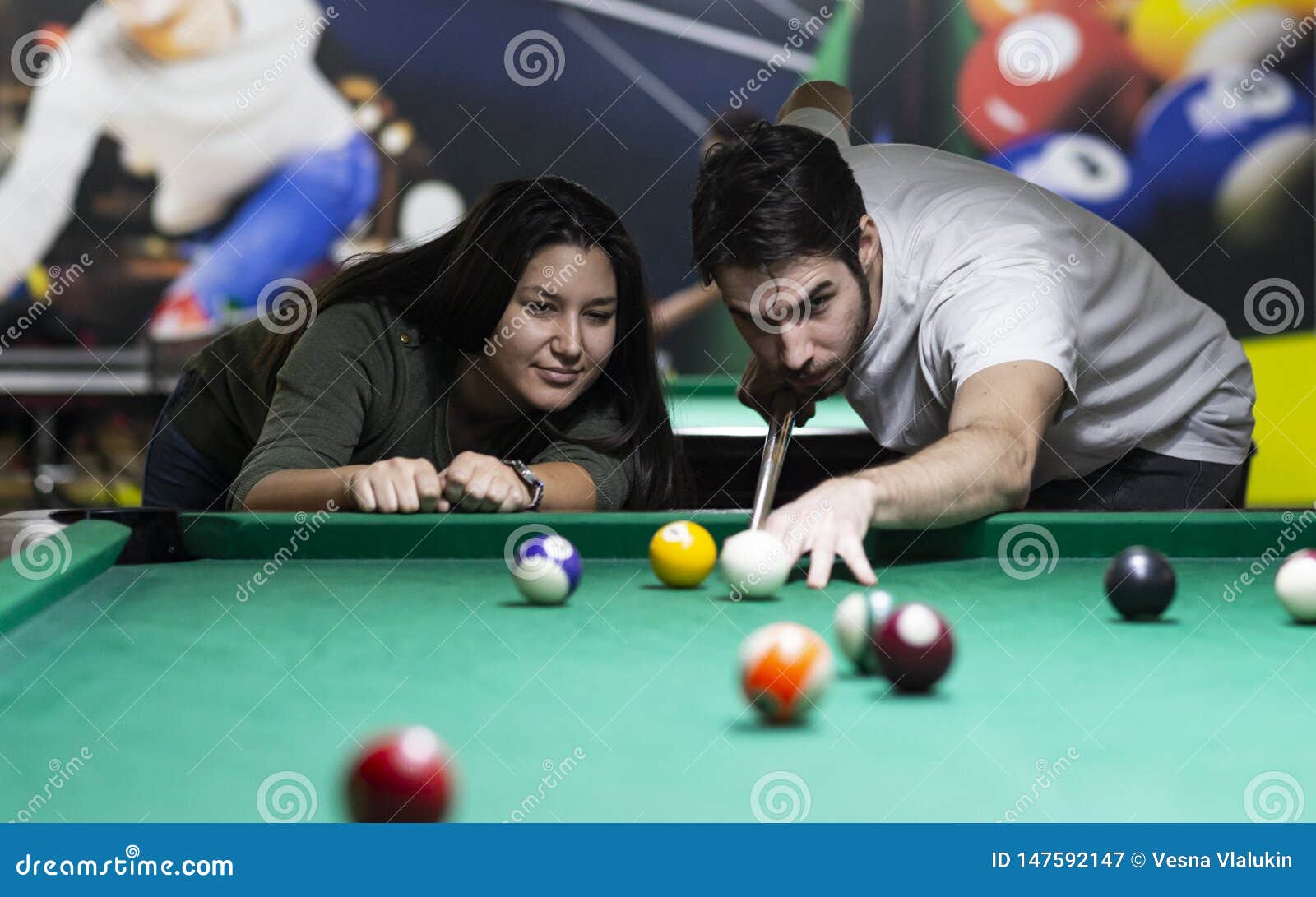 Young Couple Playing Snooker Together in Bar Stock Image - Image of ...