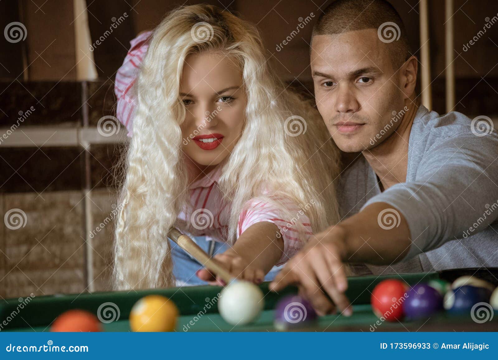 Young People Playing Snooker at Bar Stock Image - Image of posing ...